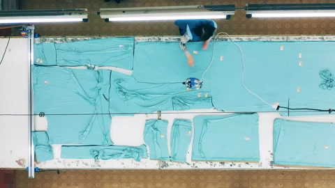 Top view of a factory worker using a mac... | Stock Video | Pond5