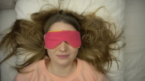 Top view falling beautiful girl on the b... | Stock Video | Pond5