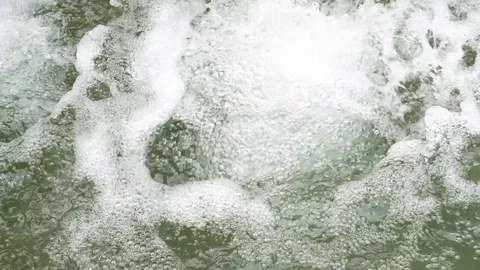 Top view of falling water Causing a smal... | Stock Video | Pond5