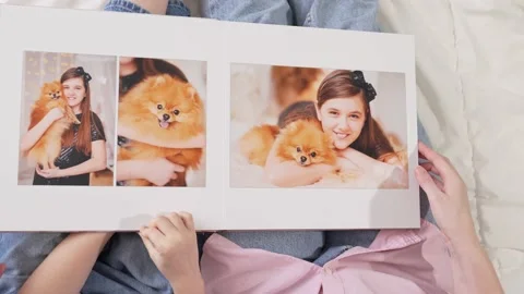 top view. flip through a photobook with ... | Stock Video | Pond5