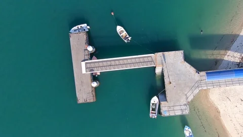 Top View flying over from the pier to th... | Stock Video | Pond5