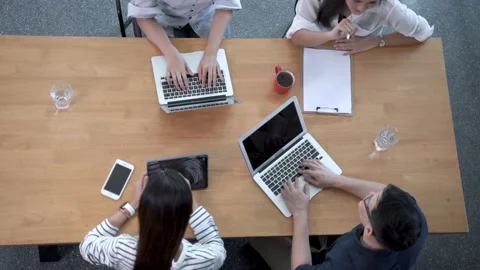 Top view of four business people sittin... | Stock Video | Pond5