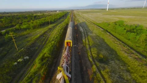 Top view of freight train on green field... | Stock Video | Pond5