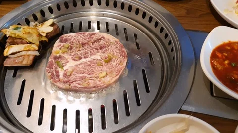 Top view fresh beef sirloin cut sizzling... | Stock Video | Pond5
