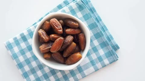 top view of fresh date fruit in a bowl o... | Stock Video | Pond5