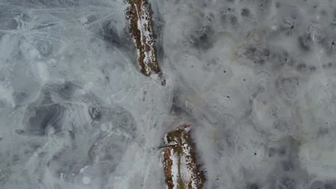 Top view of the frozen lake camera moves... | Stock Video | Pond5