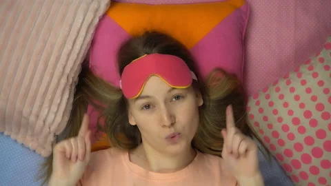 Top view of funny beautiful girl lies an... | Stock Video | Pond5