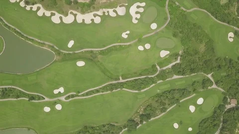 Top view green golf courses and lake fro... | Stock Video | Pond5