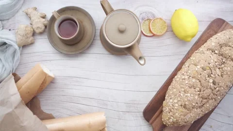 top view of green tea and baked bread on... | Stock Video | Pond5