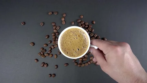 Top view of hand take cup of coffee on c... | Stock Video | Pond5
