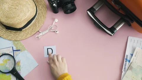 Top view hands laying on pink desk word ... | Stock Video | Pond5