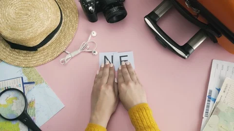 Top view hands laying on pink desk word ... | Stock Video | Pond5