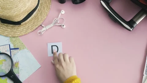 Top view hands laying on pink desk word ... | Stock Video | Pond5