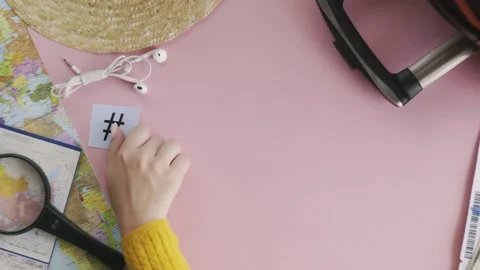 Top view hands laying on pink desk word ... | Stock Video | Pond5