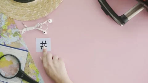 Top view hands laying on pink desk word ... | Stock Video | Pond5