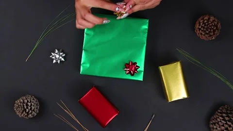 Top view of a hands sticking the gift bo... | Stock Video | Pond5