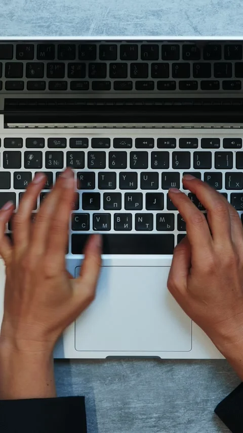 Top view of hands typing on laptop keybo... | Stock Video | Pond5