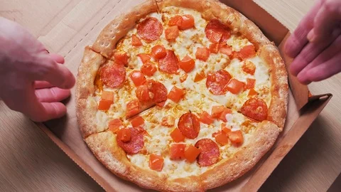 Top view of human hands taking pizza sli... | Stock Video | Pond5