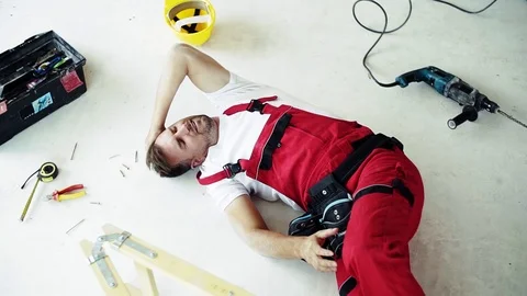 Top view of an injured man lying on the ... | Stock Video | Pond5