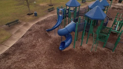 Top view of kids playing in a playground | Stock Video | Pond5