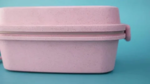 top view of a lunch box on color backgro... | Stock Video | Pond5