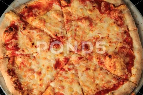 Top view macro sliced four cheese pizza on black background ~ Premium ...