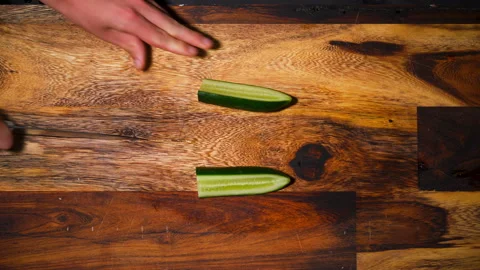 Top view of a male hand slicing half a c... | Stock Video | Pond5