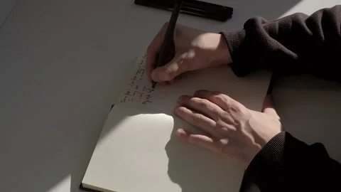 Top view: Male hands writing text on Eng... | Stock Video | Pond5