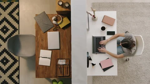 Top View of Man and Woman Working from H... | Stock Video | Pond5
