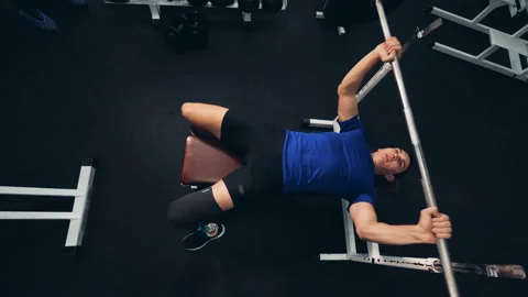 Top view of a man with a bionic leg is l... | Stock Video | Pond5