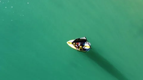 Top view of a man in a dinghy, a man is ... | Stock Video | Pond5