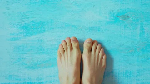 top view of man feet on blue backdrop. F... | Stock Video | Pond5