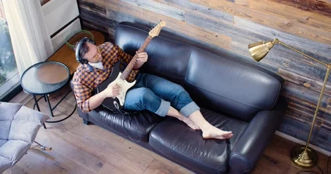 Top view of a man plays the electric gui... | Stock Video | Pond5