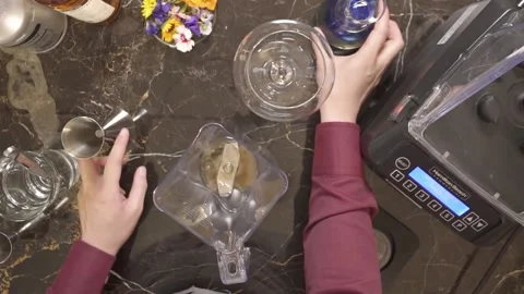 top view of man pouring syrup in jigger ... | Stock Video | Pond5