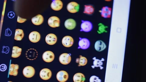 top view man's hand scrolling emoticon y... | Stock Video | Pond5