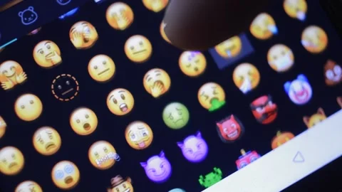 top view man's hand scrolling emoticon y... | Stock Video | Pond5
