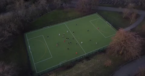 Top View. Men play football with coach a... | Stock Video | Pond5