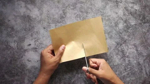 top view of mens hand cutting a blank pa... | Stock Video | Pond5