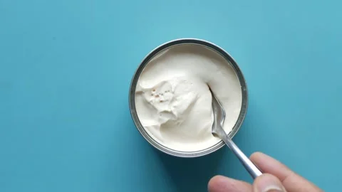 top view of milk cream in a container on... | Stock Video | Pond5