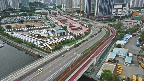 Top view over MTR Light Rail as it cross... | Stock Video | Pond5