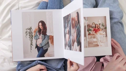 top view. pages of a photobook with phot... | Stock Video | Pond5