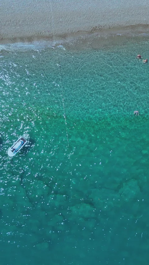 Top view of people enjoying sunbathing a... | Stock Video | Pond5
