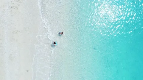 Top view of people running and diving in... | Stock Video | Pond5