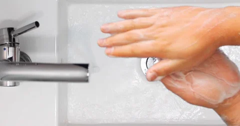 Top view of a person washing hands with ... | Stock Video | Pond5