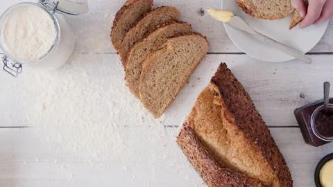 Top View Picking Up and Spreading Butter... | Stock Video | Pond5