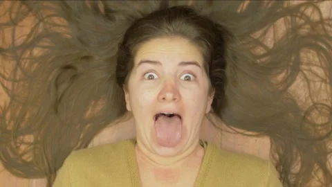 Top view portrait of young woman doing f... | Stock Video | Pond5