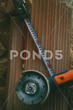 Photograph: Top view of a radial, meter, carpenter's pencil - tools for ...