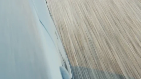 Top View, Road and a Car Wheel | Stock Video | Pond5