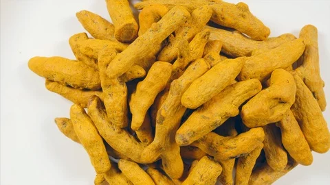 Top view of rotating dry turmeric roots ... | Stock Video | Pond5