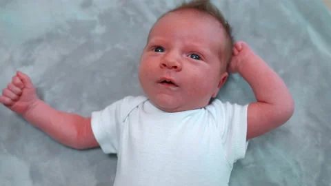 Baby Confused Stock Footage ~ Royalty Free Stock Videos | Pond5